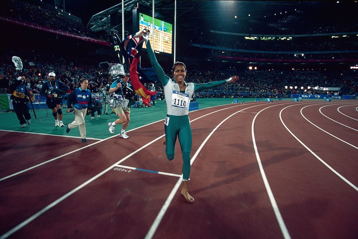Cathy Freeman after winning gold at the Olympic Games in Sydney | Simon ...